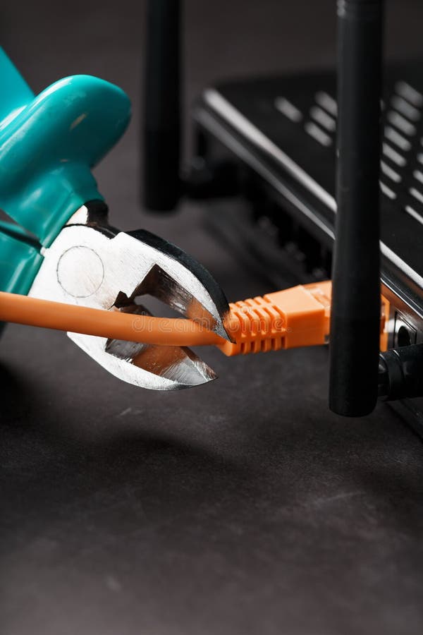 Tearing and Cutting with Blue Wire Cutters the Network Connection of ...