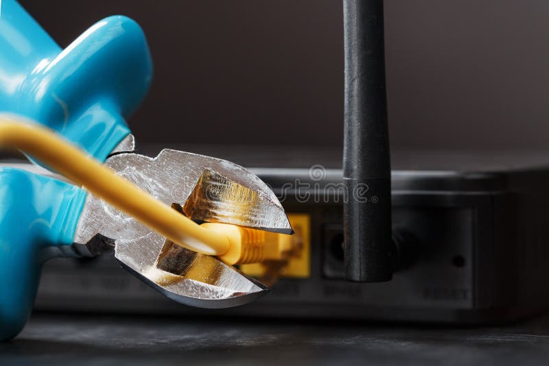 Tearing and Cutting with Blue Wire Cutters the Network Connection of ...