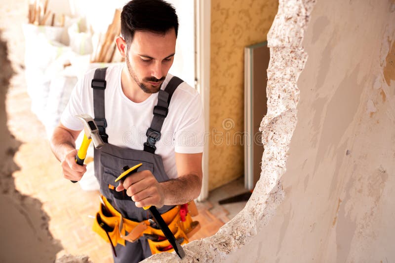 Tearing Down the Concrete Wall Stock Photo - Image of handyman ...