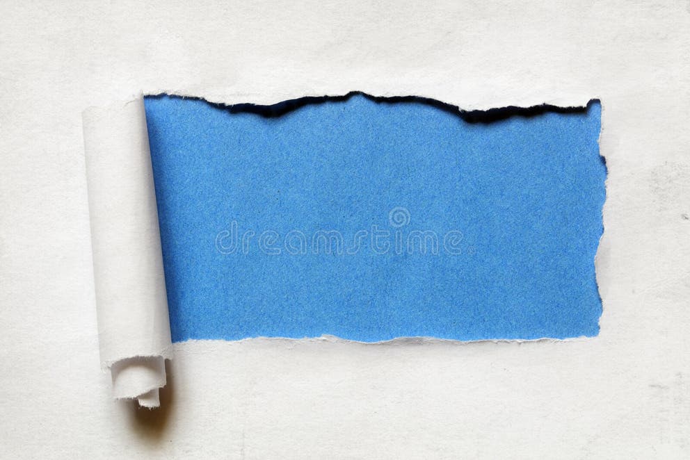 Tearing a Paper Frame Hole with Blue Background Stock Image - Image of ...