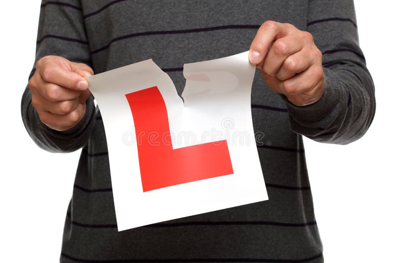 Tearing Up L Plate after Passing Driving Test Stock Photo - Image of ...