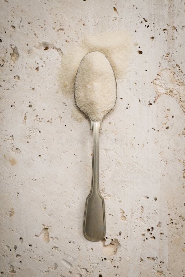 Teaspoon Filled with Golden Caster Sugar Stock Photo - Image of grain ...