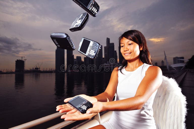 Tech Angel in the city - 1 stock image. Image of calling - 6696353