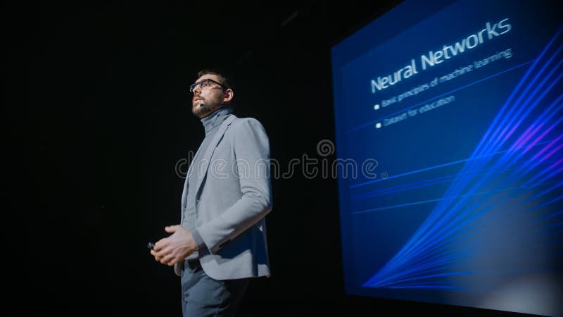 Tech Conference Stage: Speaker Talks about Product. Neural Networks ...