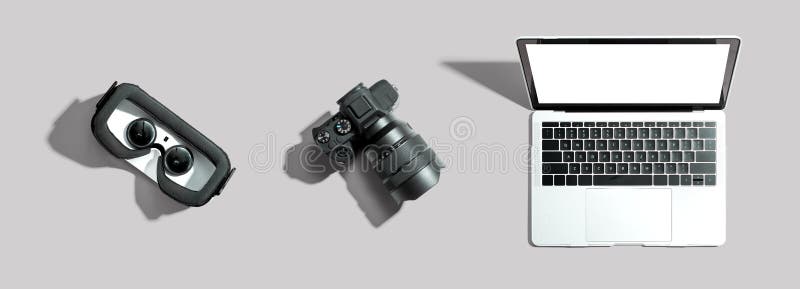 Tech Gear Theme with Vr Headset, Dslr Camera and Laptop Stock Photo ...