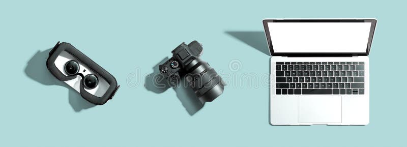 Tech Gear Theme with Vr Headset, Dslr Camera and Laptop Stock Photo ...