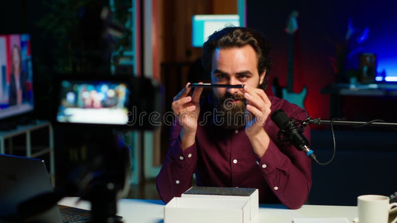 Tech Guru Assessing Smartphone Performance Stock Footage - Video of ...