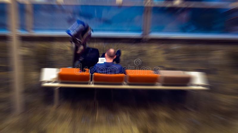 Tech on the Move - Man Surfing News on PC Tablet Editorial Photography ...