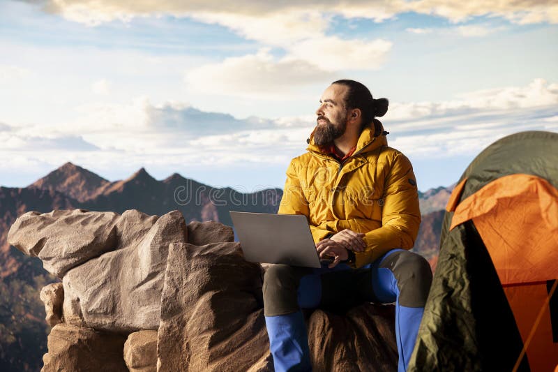 Tech Savvy Hiker Having a Technology Obsession and Working on a ...