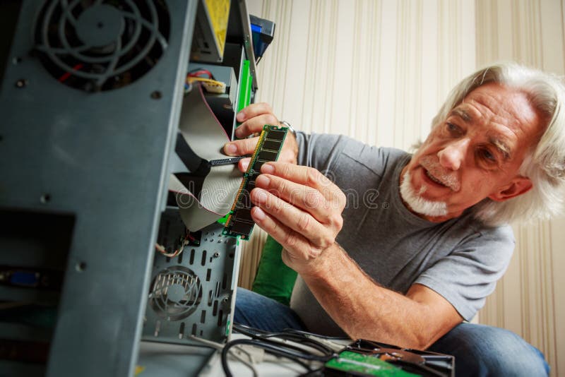 Senior Man Assembling a Desktop Computer Stock Photo - Image of open ...