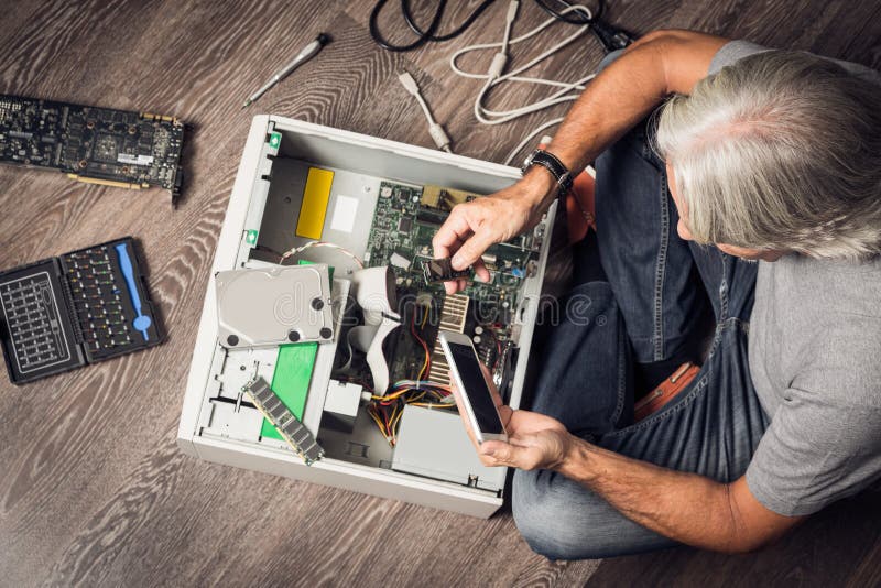 Senior Man Assembling a Desktop Computer Stock Photo - Image of sitting ...
