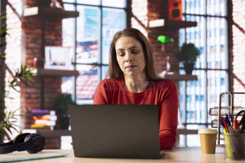Tech Savvy User Working on a Wireless Laptop To Test a New Software ...
