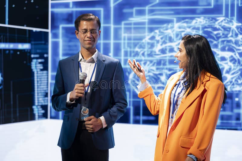 Tech Specialists Discussing during AI Keynote Event Presentation Stock ...