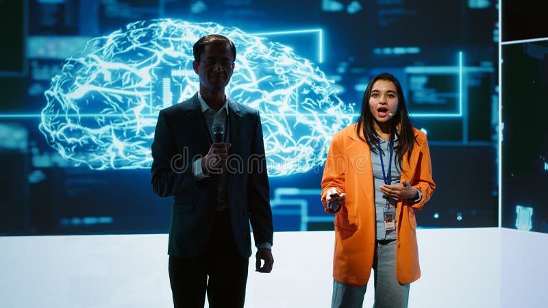 Tech Specialists Discussing during AI Keynote Summit Presentation Stock ...