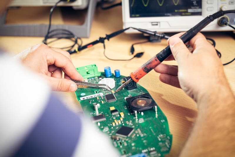 Tech Tests Electronic Equipment in Service Center Stock Photo - Image ...