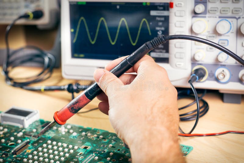 Tech Tests Electronic Equipment in Service Center Stock Photo - Image ...