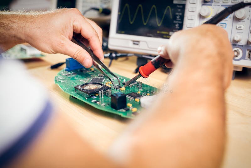 Tech Tests Electronic Equipment in Service Center Stock Image - Image ...