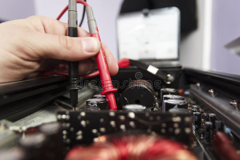 Tech Tests Electronic Equipment in Service Center Stock Image - Image ...