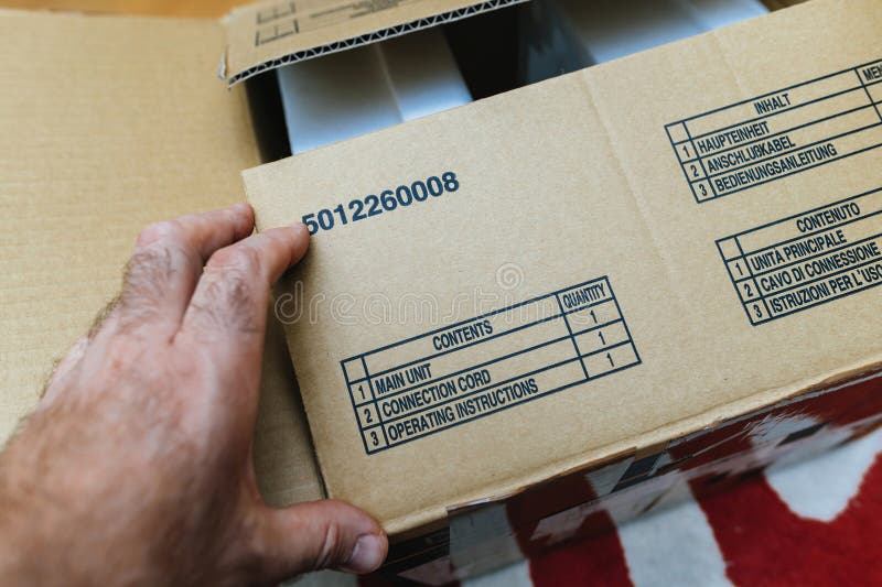 Tech Unboxing: Main Unit Cord Text on Cardboard Stock Image - Image of ...