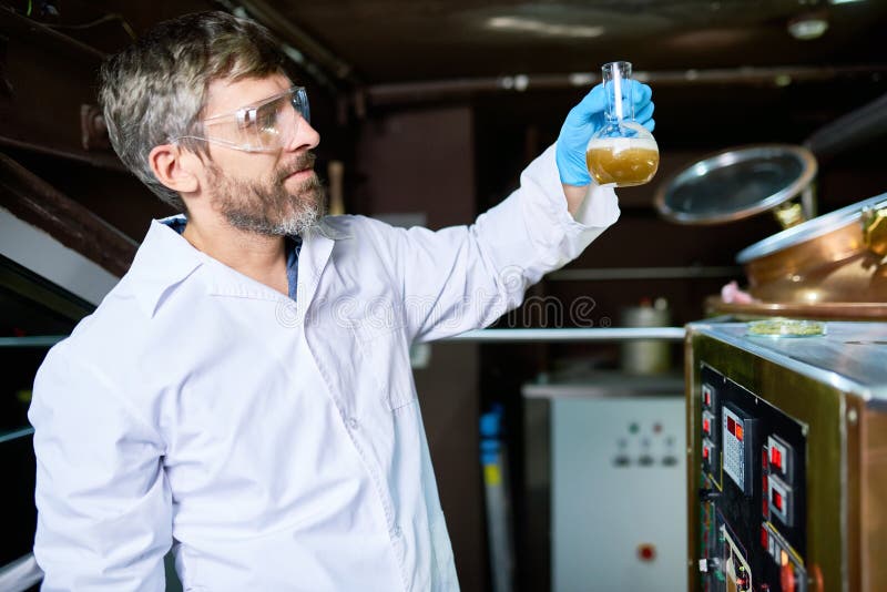 Technical Brewer Elaborating New Formula of Beer Stock Photo - Image of ...