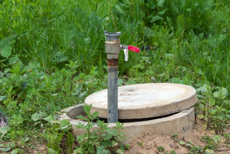 Technical Concrete Well with a Pipe and a Lever for Water Supply. Stock ...