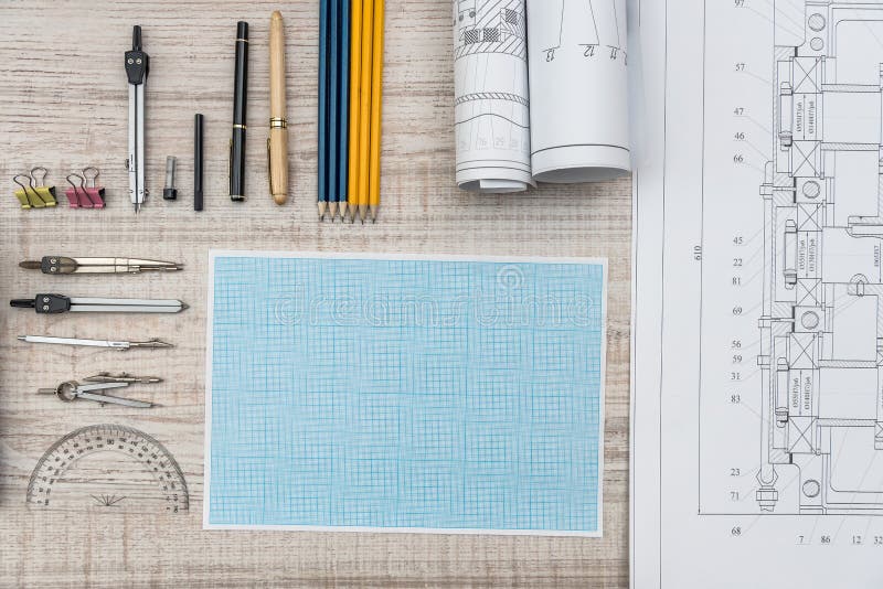 Paper with Technical Drawings and Work Tool on Table. Place of Work ...