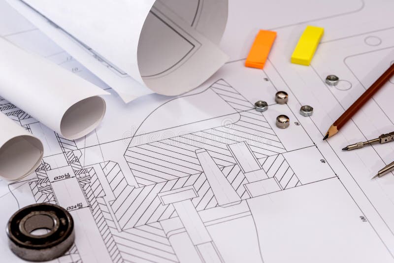 Paper with Technical Drawings and Work Tool on Table. Place of Work ...