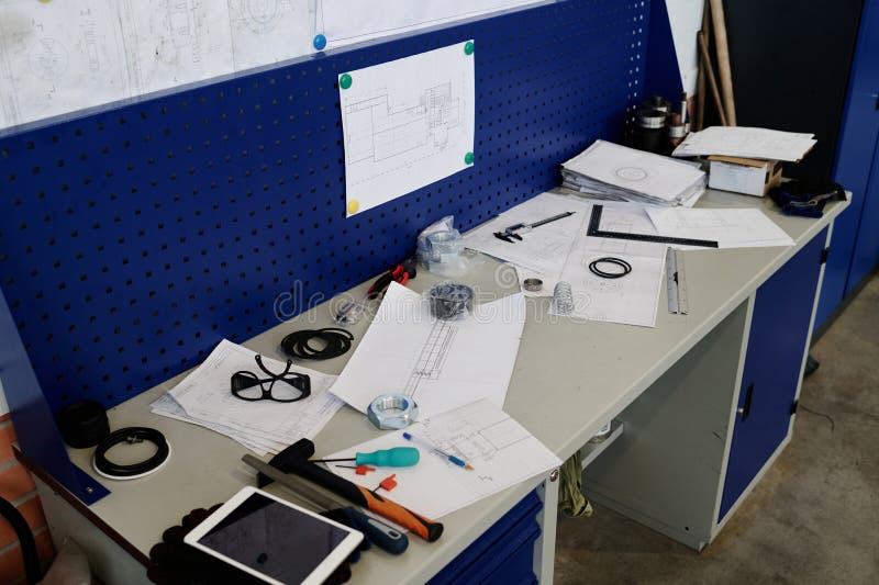 Technical Drawings on Desk in Factory Stock Image - Image of factory ...