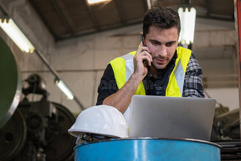 Technical Engineer Wearing Safety Vest Standing in the Factory ...