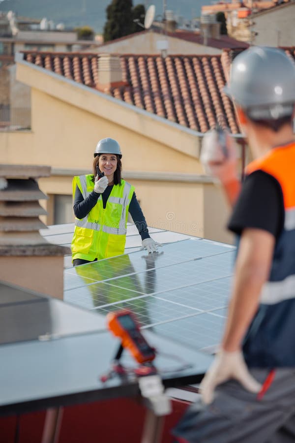 Woman and Man Engineer Technicians Doing Maintenance Service Solar ...