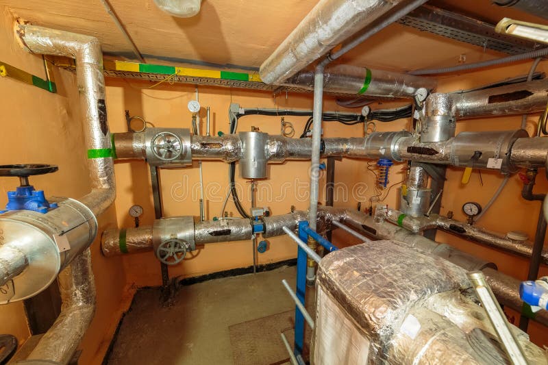 Technical Heating Pipes with a Pressure Gauge in the Basement of a ...