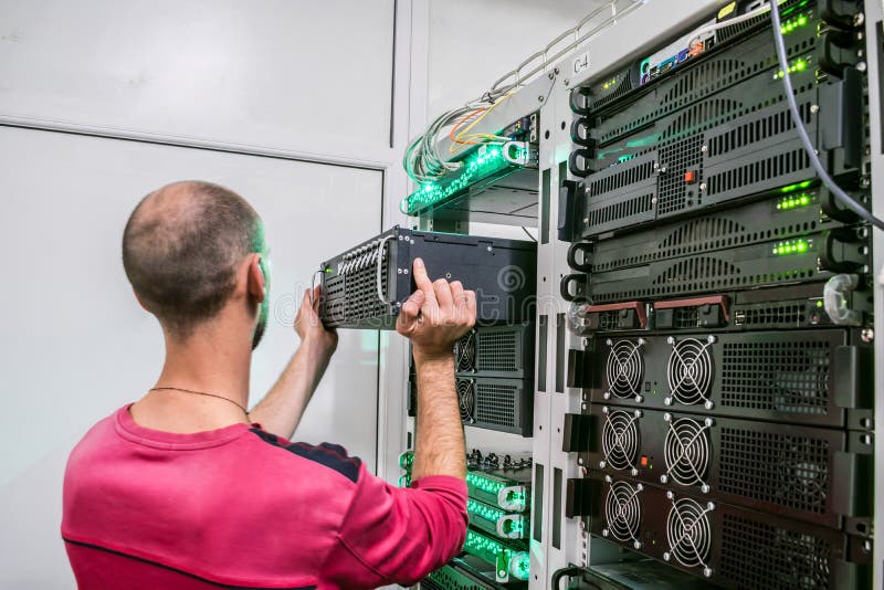 Technical Support Engineer Performs the Installation of a New Server in ...