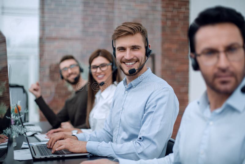 Technical Support Specialist on the Background of Colleagues Stock ...