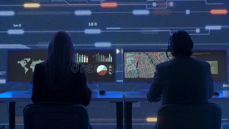 Technical Support Team in Control Room. it Specialists in Headsets Work ...