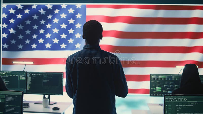 A Technical Team in a Governmental Cyber Environment with the USA Flag ...