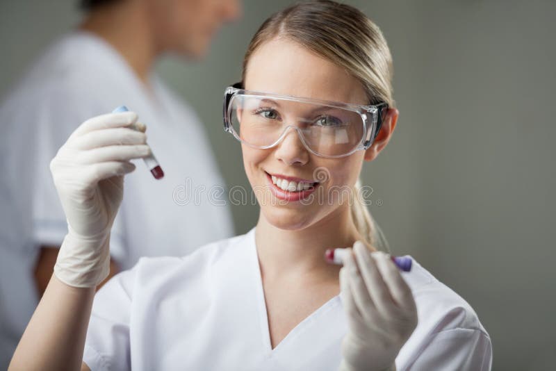 Technician Analyzing Blood Samples in Lab Stock Image - Image of happy ...