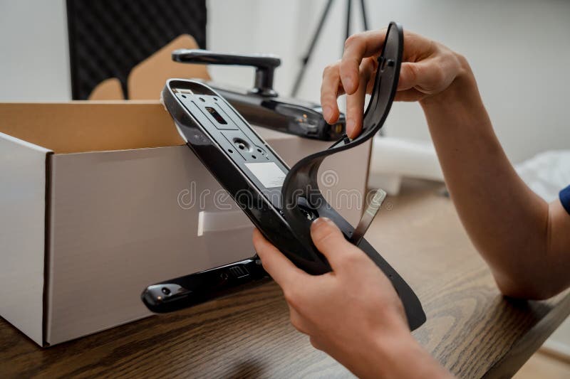 A Technician Assembles and Installs Smart Electronic Door Lock for ...