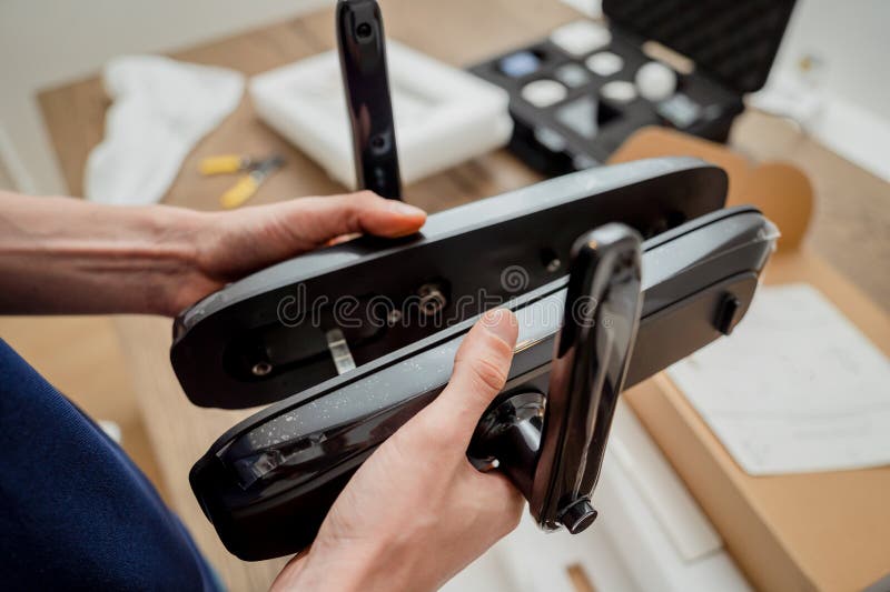 A Technician Assembles and Installs Smart Electronic Door Lock for ...