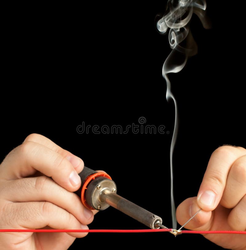 Technician Bonding Two Wires with a Solder Joint. Stock Image - Image ...