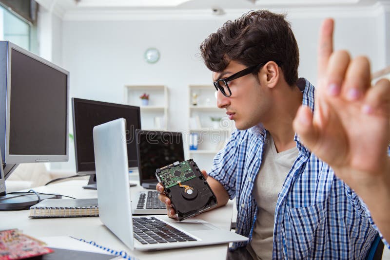 The Technician with Broken Hard Drive Stock Photo - Image of harddrive ...