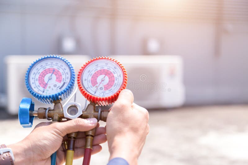 Technician is Checking Air Conditioner ,measuring Equipment for Filling ...