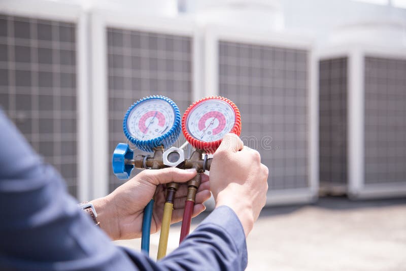 Technician is Checking Air Conditioner ,measuring Equipment for Filling ...