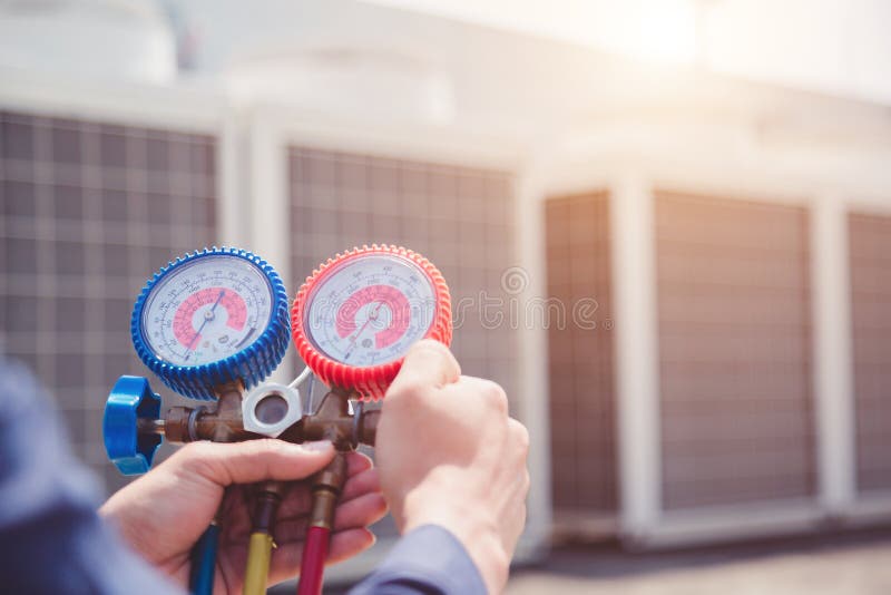 Technician is Checking Air Conditioner ,measuring Equipment for Filling ...