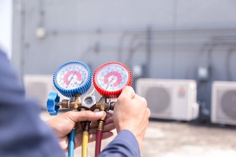Technician is Checking Air Conditioner ,measuring Equipment for Filling ...