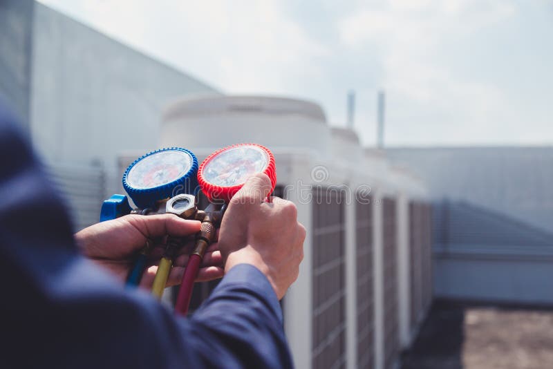 Technician is Checking Air Conditioner ,measuring Equipment for Filling ...