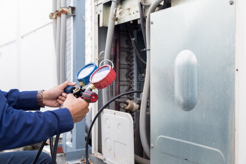 Technician is Checking Air Conditioner ,measuring Equipment for Filling ...