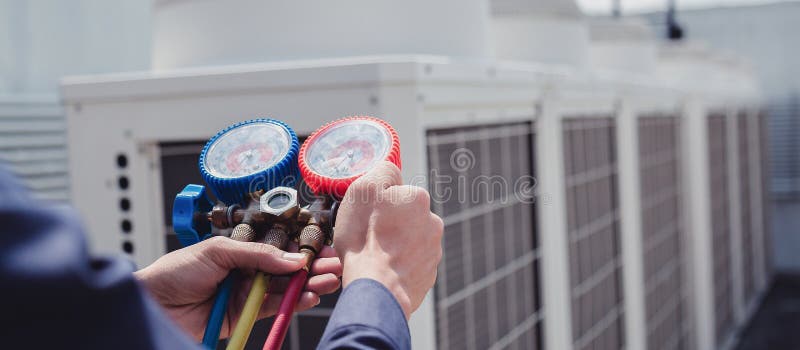 Technician is Checking Air Conditioner ,measuring Equipment for Filling ...