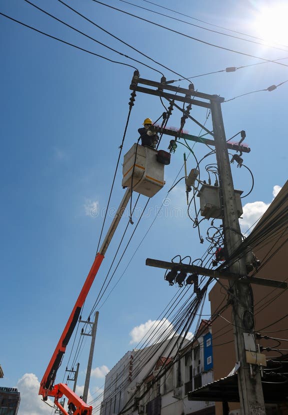 Technician Checking Fixing Broken Electric Wire on Pole Stock Photo ...
