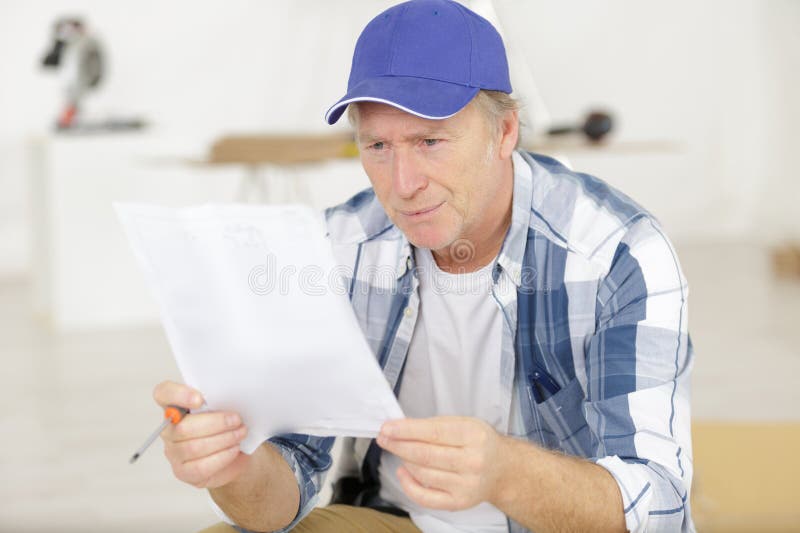 Technician Checking Paperwork Stock Image - Image of person, safety ...