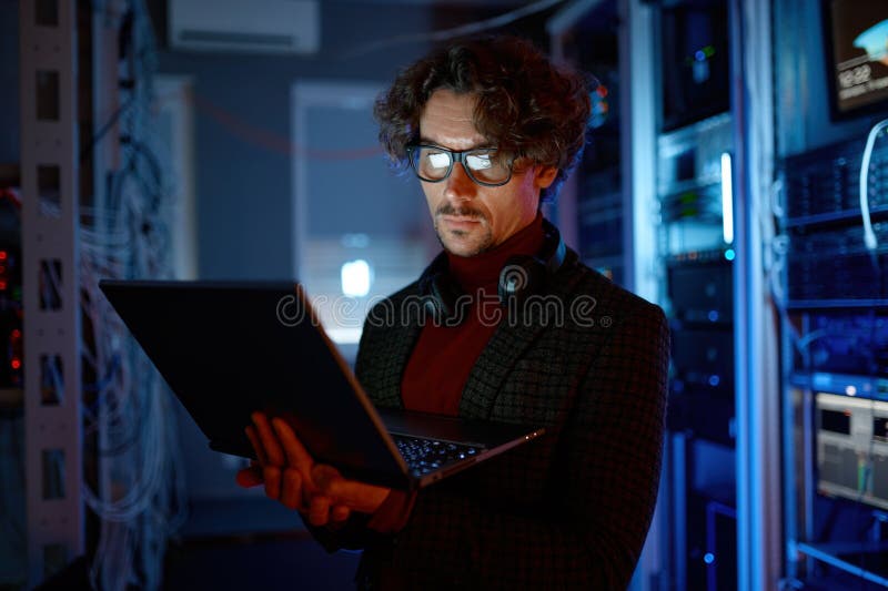 It Technician Checking the Servers Vitals Using Laptop Computer Stock ...